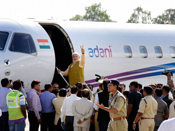 Modi back in New Delhi, talks on cabinet formation resume - Oneindia News