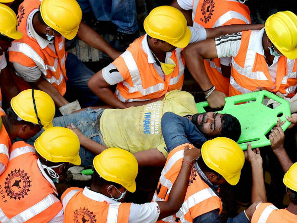 Building collapse toll rises to 32; 3 more survivors rescued - Oneindia ...
