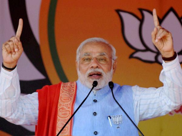 Finger pressing EVM stronger than one on AK-47: Modi - Oneindia News