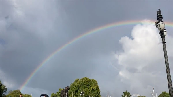 In pics: Rare double rainbow encircles Buckingham Palace as thousands ...