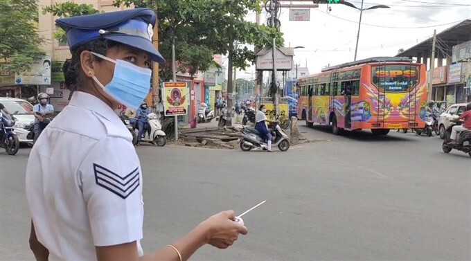Traffic Police Use Modern Machine For Controlling Traffic Signals In ...