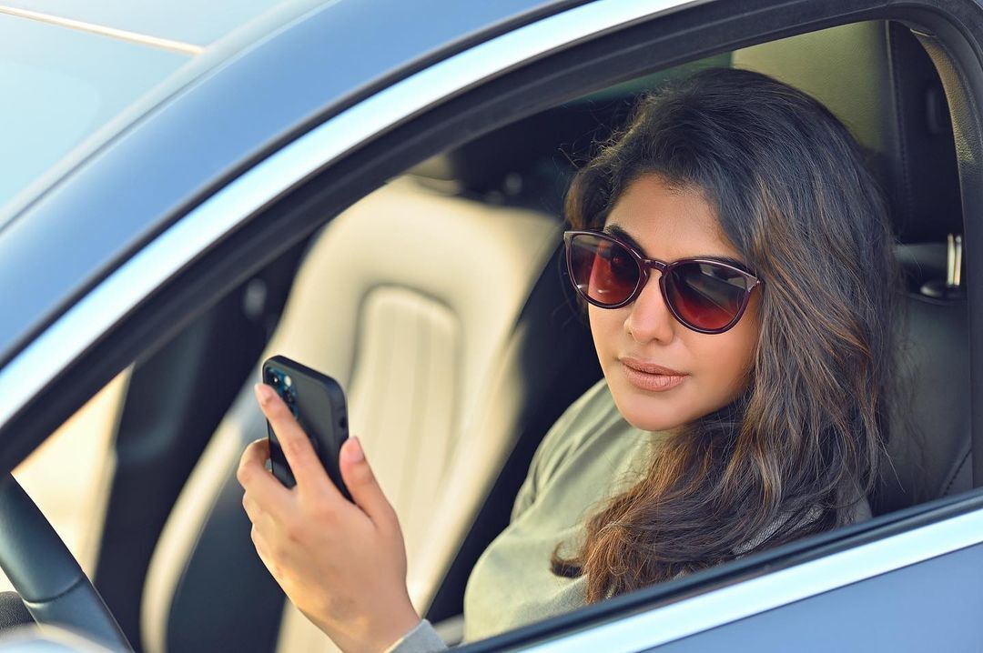 Actress Meera Nandan in Top Glamorous Red Outft in a Luxurious Car ...