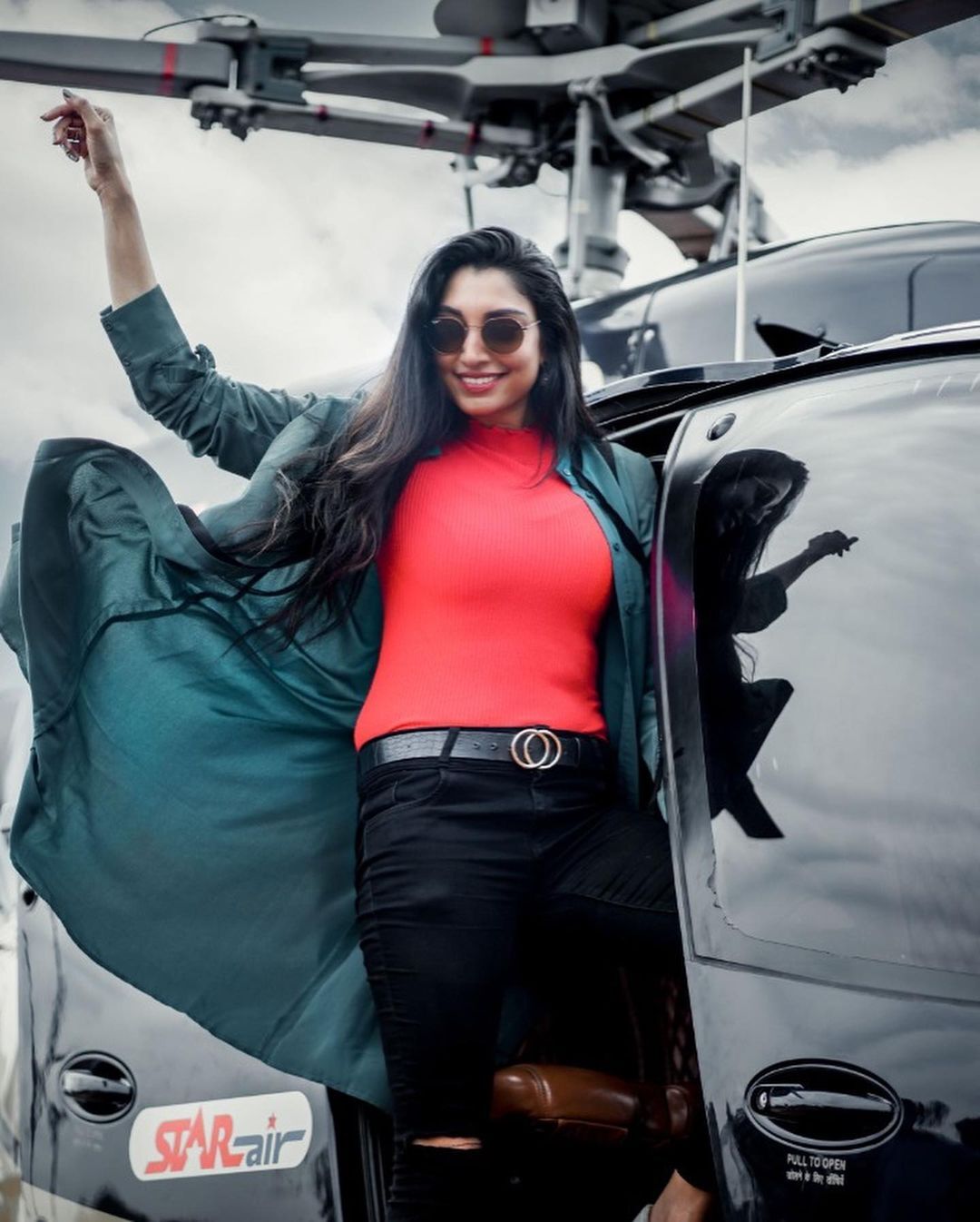 Actress And Model Rithu Manthra New Stylish Look Sitting On A ...