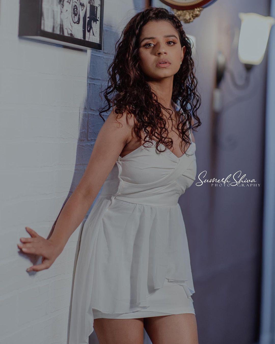 Actress Meenakshi Raveendran New Stylish And Bold Look In White Dress ...