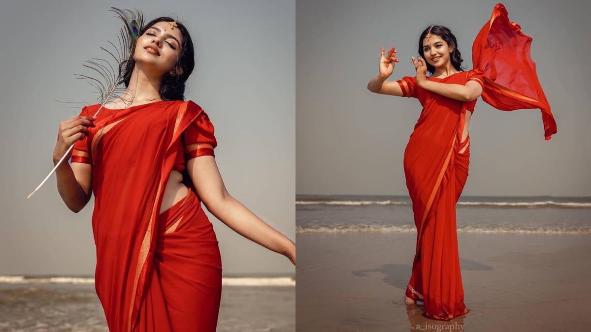 Actress Mamitha Baiju Looks Stunning in Red Sareee in Beach Side Clicks ...