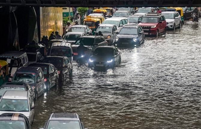 Monsoon Deluge In New Delhi: City Drenched In Heavy Rainfall; See ...