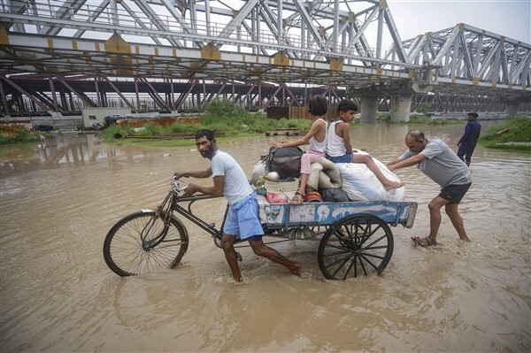 People From Low-lying Areas Around The Yamuna River Relocating To A ...