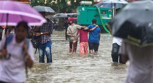 Title: Mumbai Rains: IMD's Red Alert Extended, Mumbai City Battles ...
